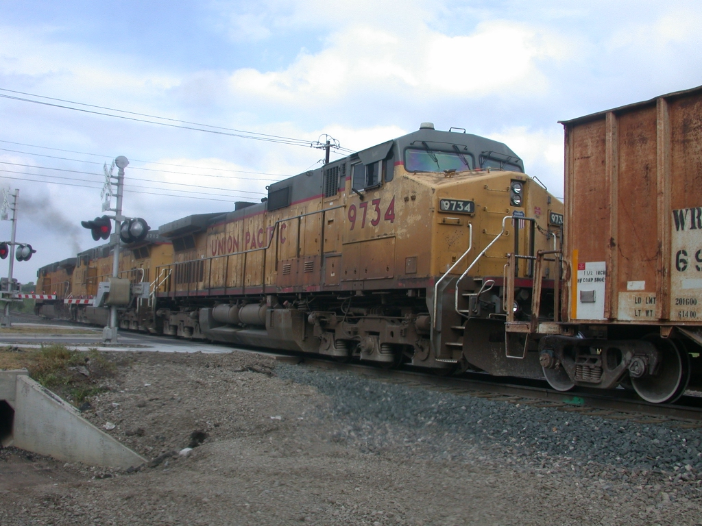 UP 9734, 1Apr2010 #3 in a three-unit power pulling aggragate NB in BERGSTROM at Dittmar Road